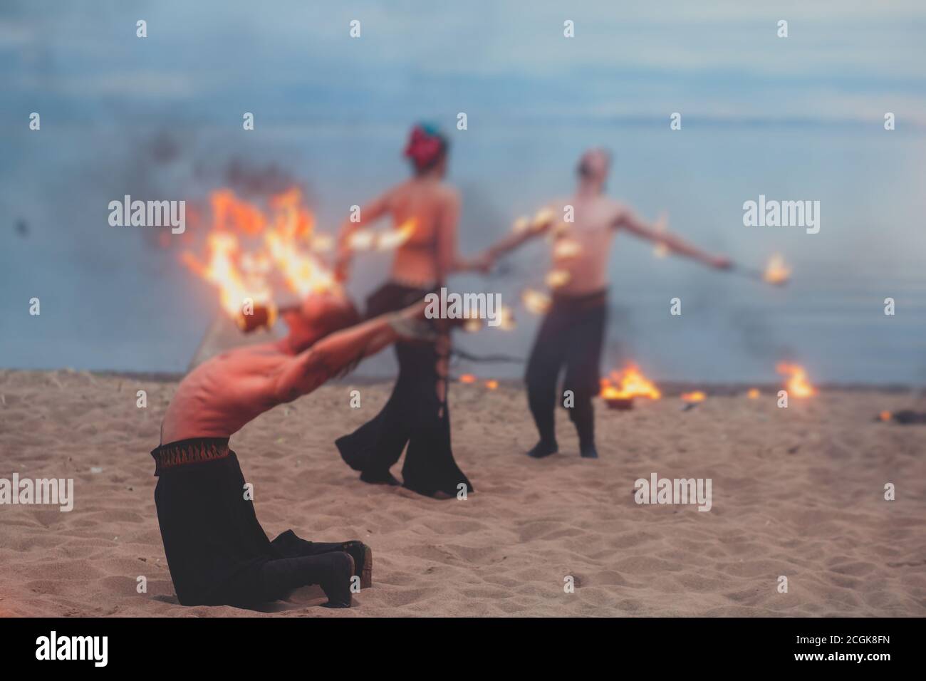 Group of fire artists fakir perform amazing show at night with ...