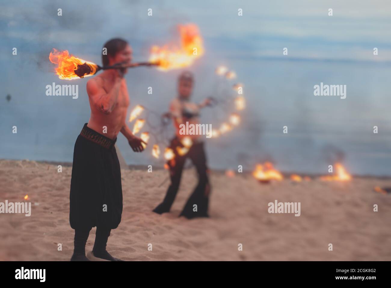 Group of fire artists fakir perform amazing show at night with ...