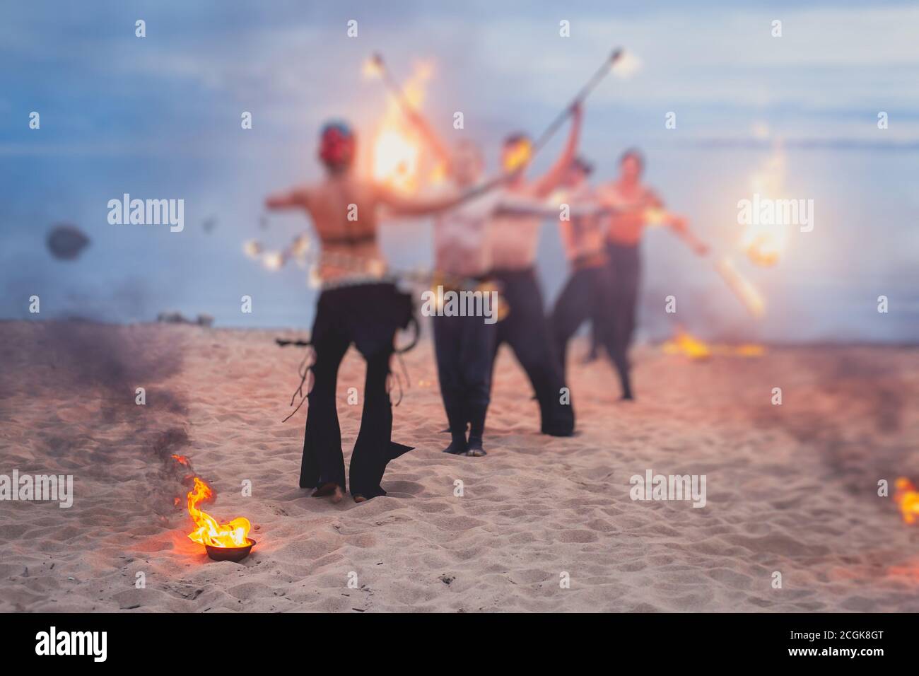 Group of fire artists fakir perform amazing show at night with ...