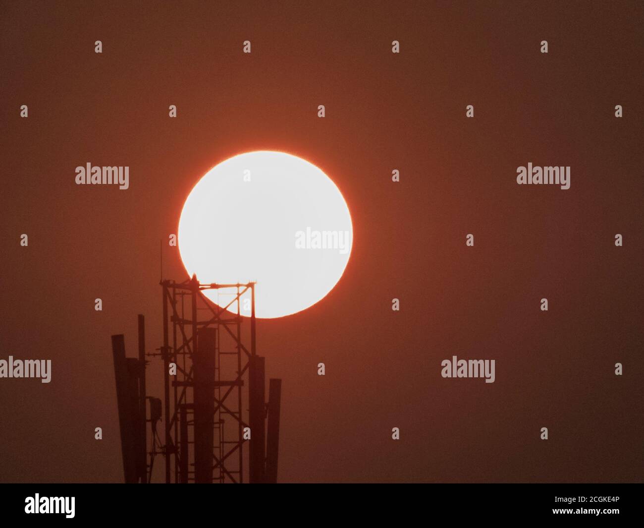 Silhouette of telecom towers Stock Photo - Alamy