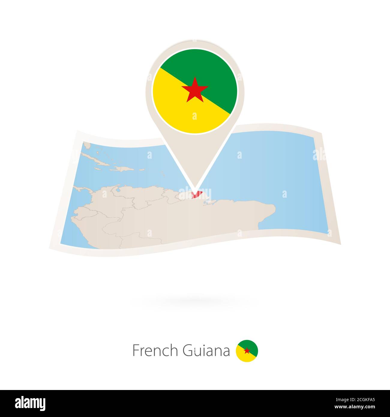 Folded paper map of French Guiana with flag pin of French Guiana ...
