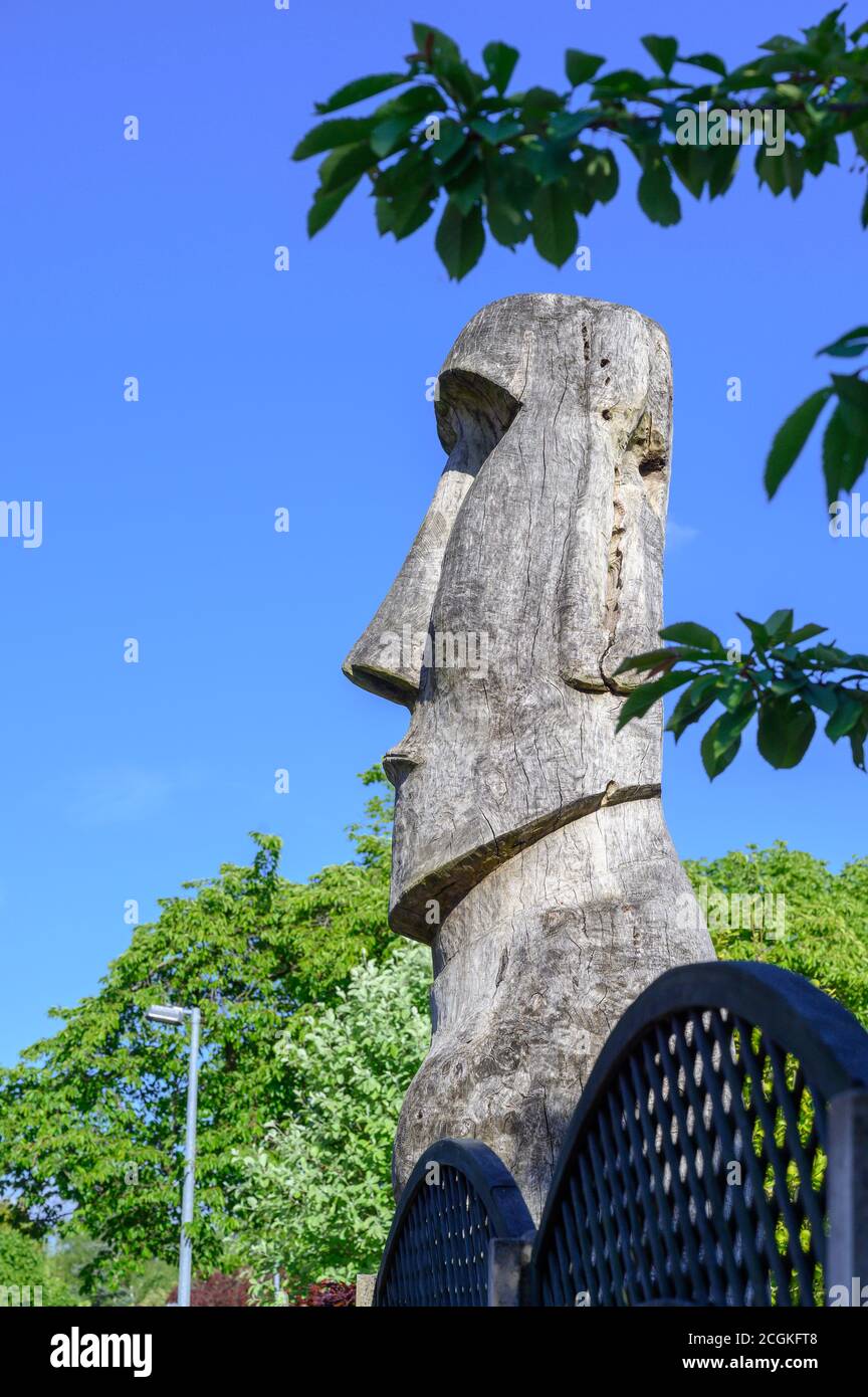 Easter Island carved tree statue, Worsley, Manchester Stock Photo - Alamy