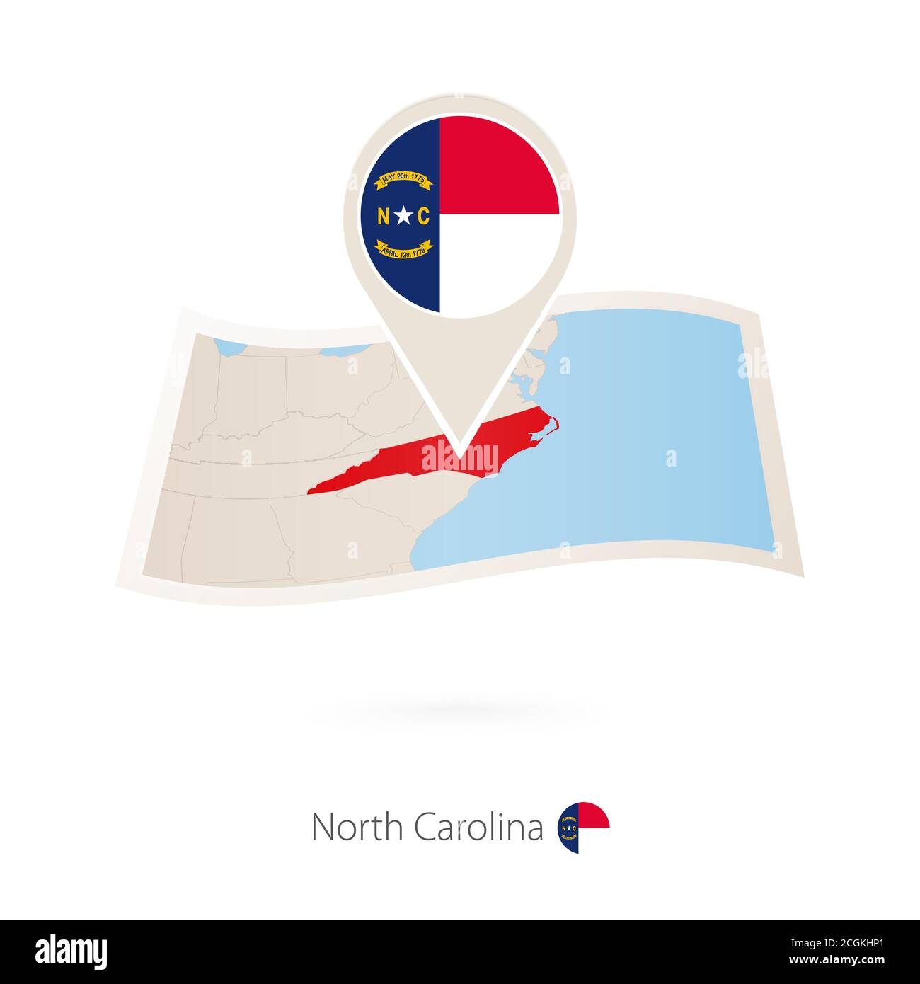 Folded paper map of North Carolina U.S. State with flag pin of North ...