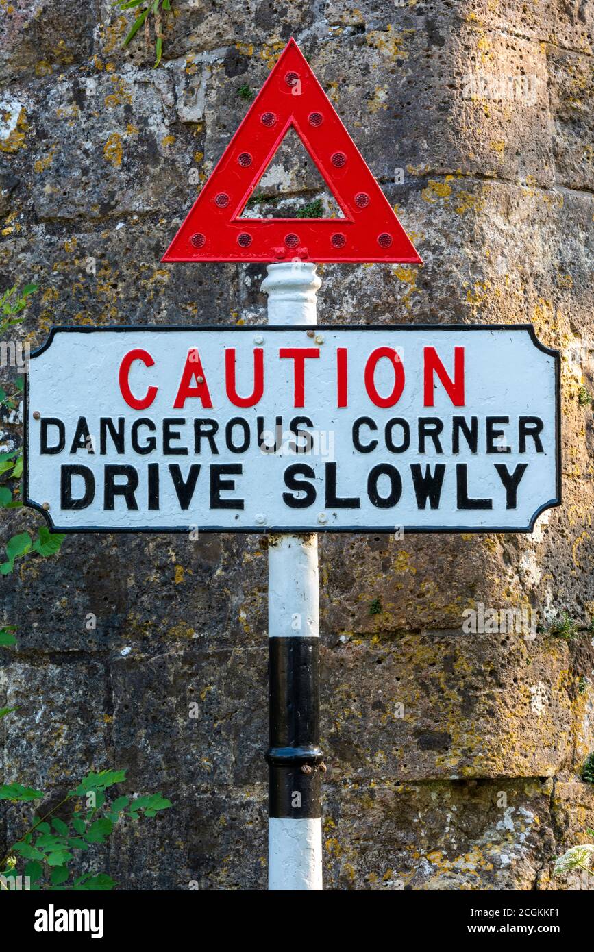 vintage road sign made from cast iron warning of danger corner drive ...