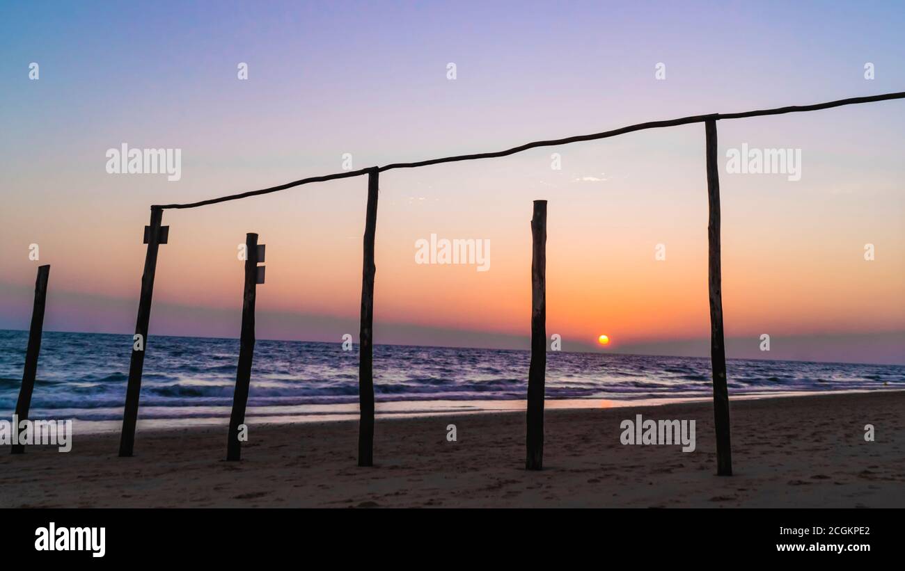 Wooden poles on the beach hi-res stock photography and images - Alamy