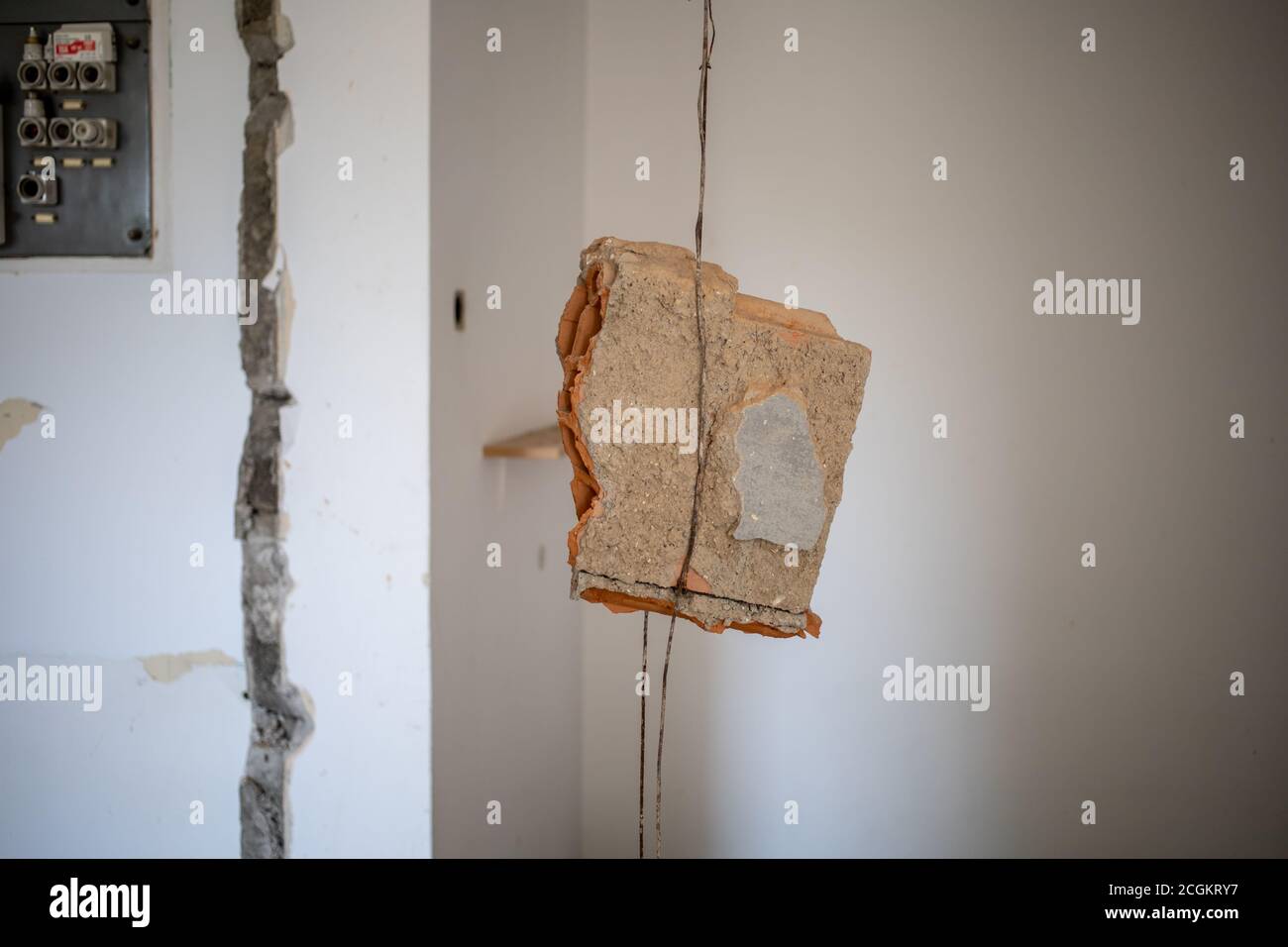 apartment renovation piece of wall hanging on reinforcement Stock Photo ...
