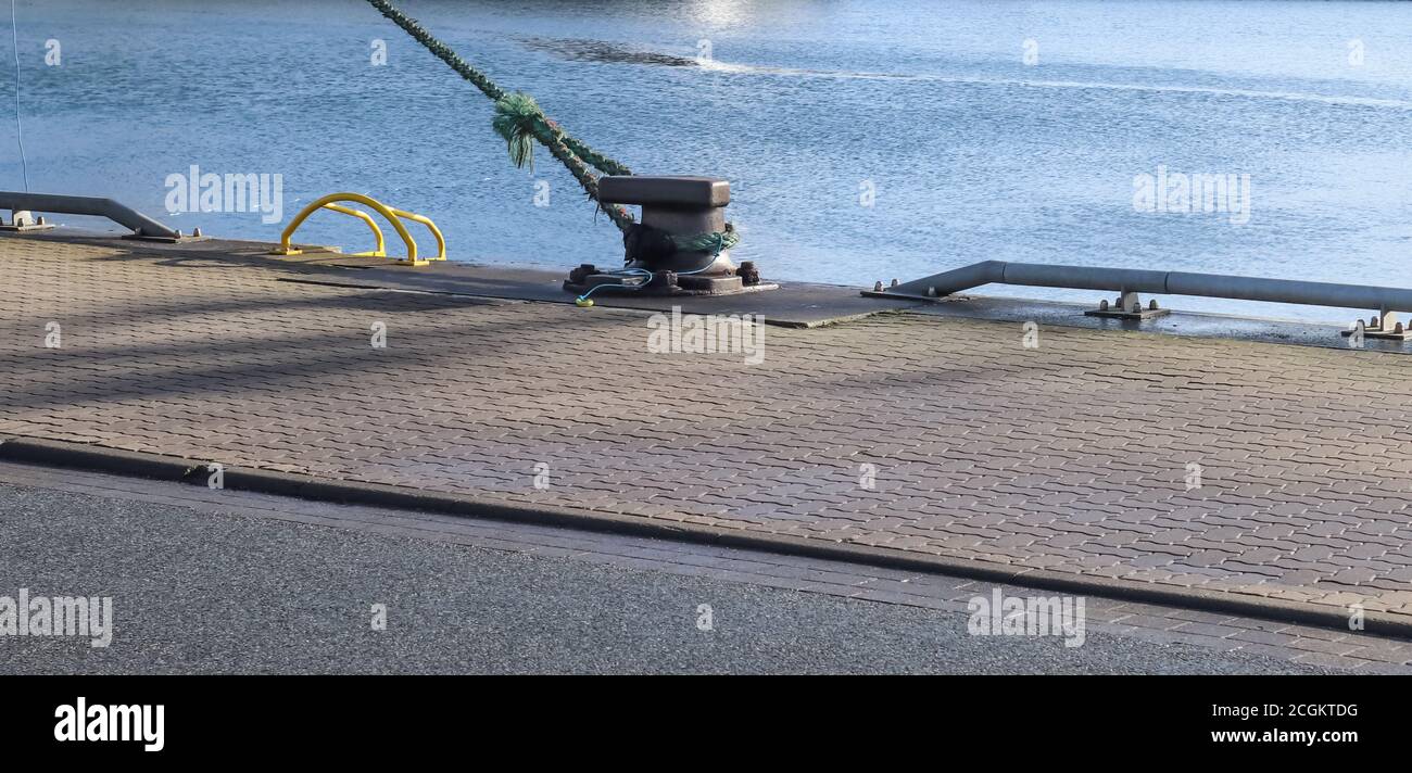 Different bollards and technical installations of vessel traffic at a ...