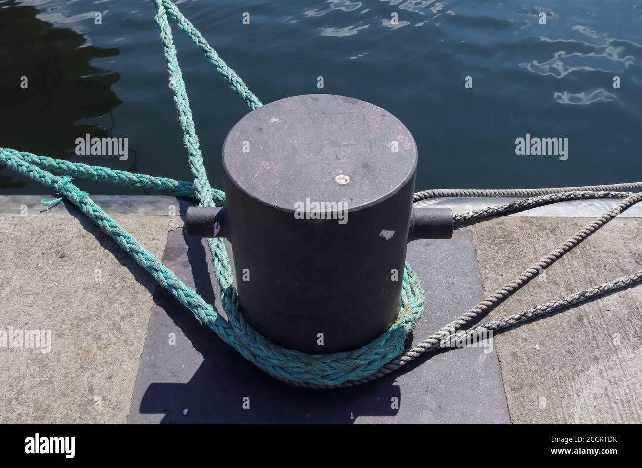 Different bollards and technical installations of vessel traffic at a ...
