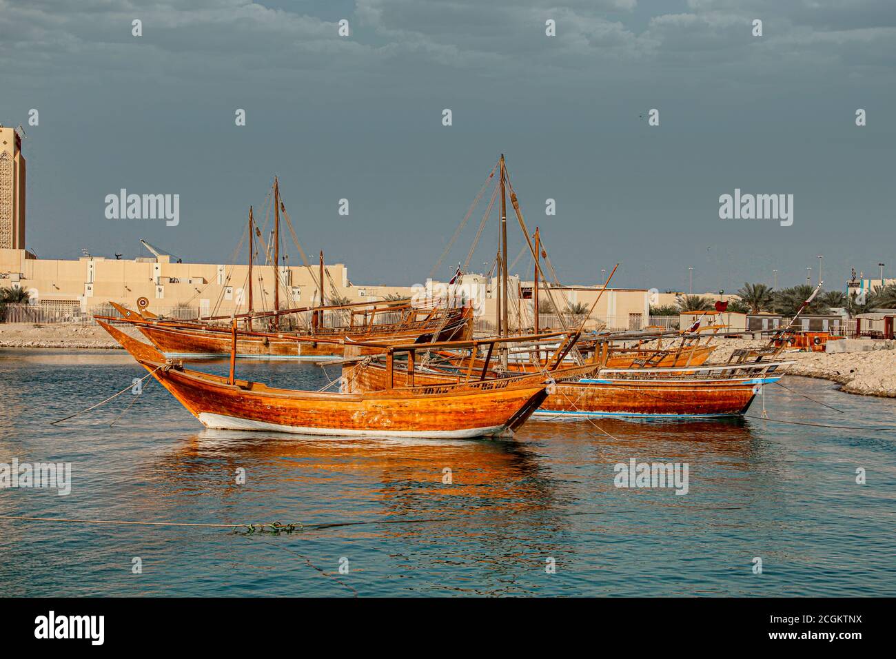 Traditional boats called Dhows are anchored in the port near Museum of ...