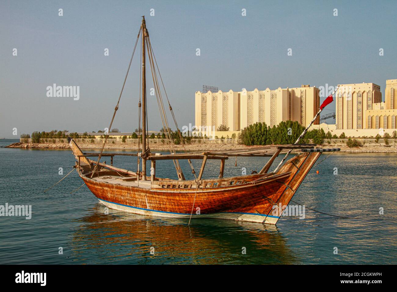 Traditional boats called Dhows are anchored in the port near Museum of ...