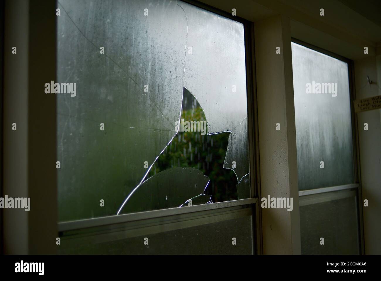 Large hail stones in severe storm smashing and breaking windows ...
