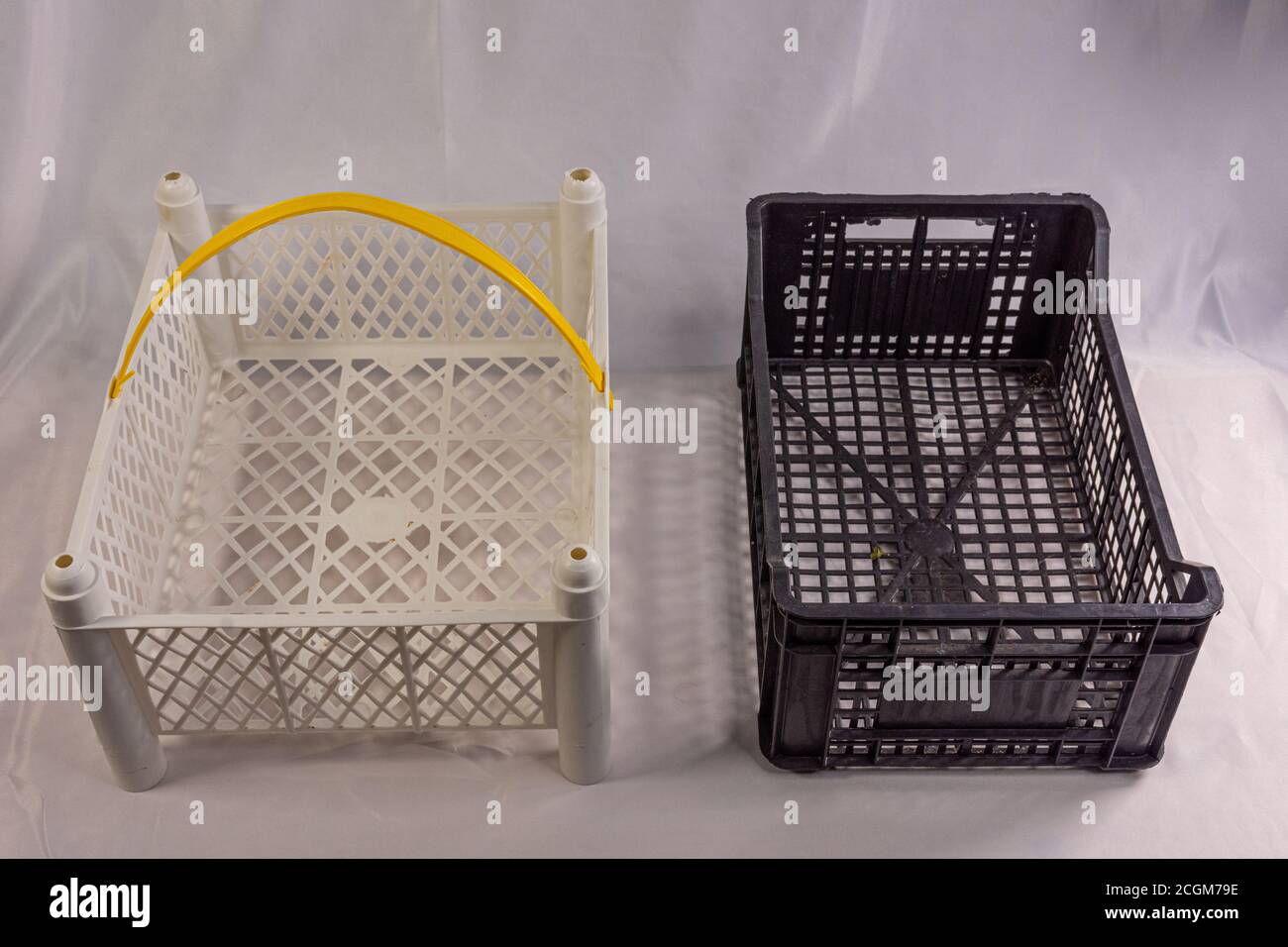 Colored plastic baskets for transport Stock Photo - Alamy