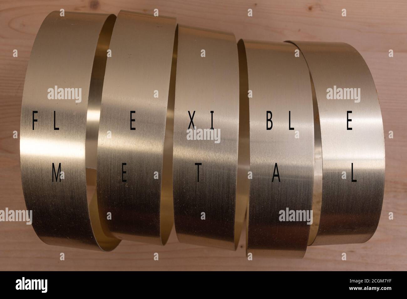 Flexible metal strip. Easy processing concept Stock Photo - Alamy Flexible metal strip. Easy processing concept Stock Photo - Alamy