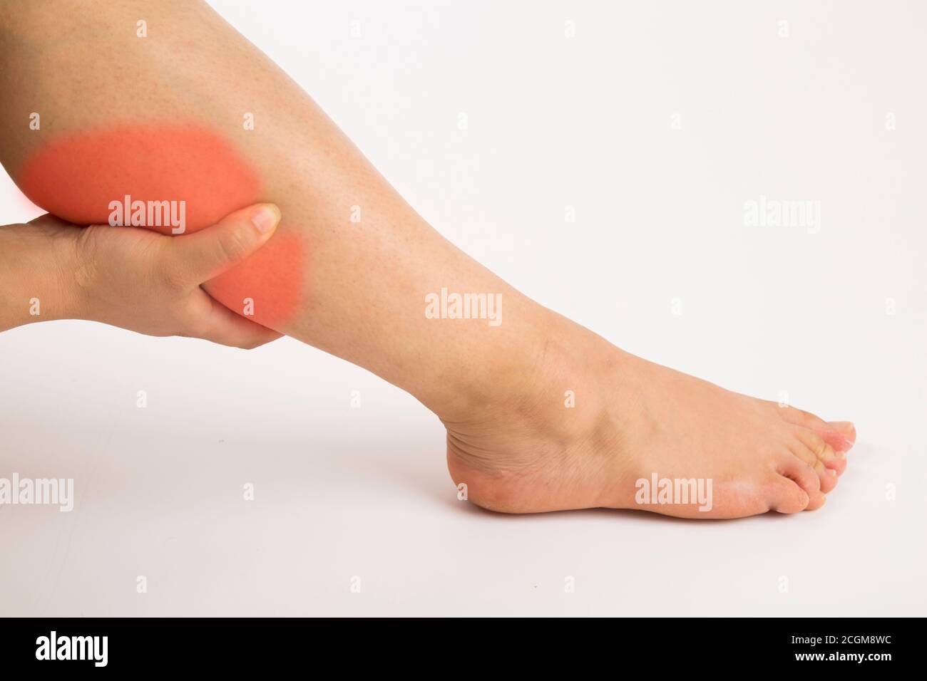 woman leg pain isolated white background Stock Photo - Alamy