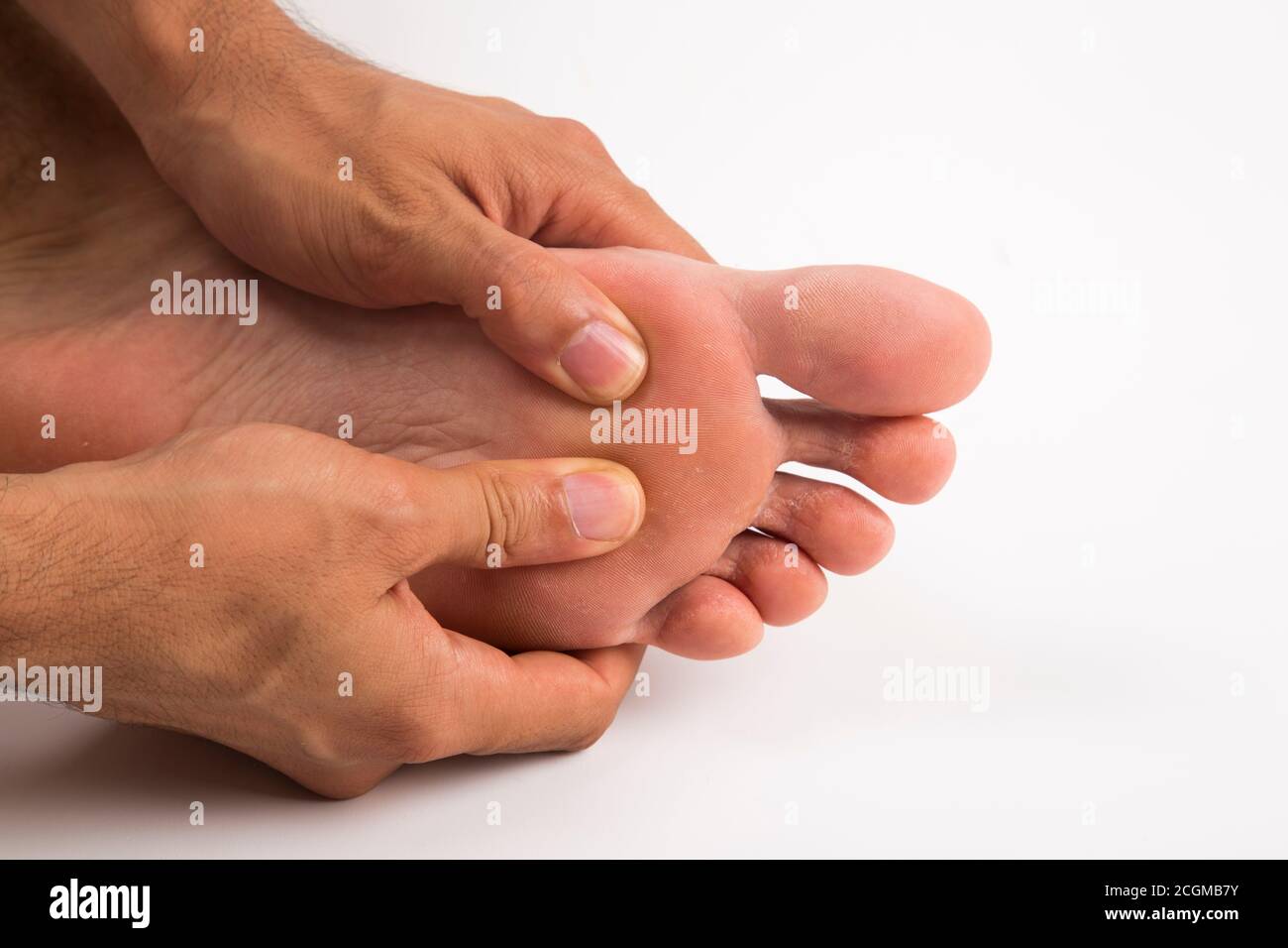 foot massage on white and isolated background Stock Photo - Alamy