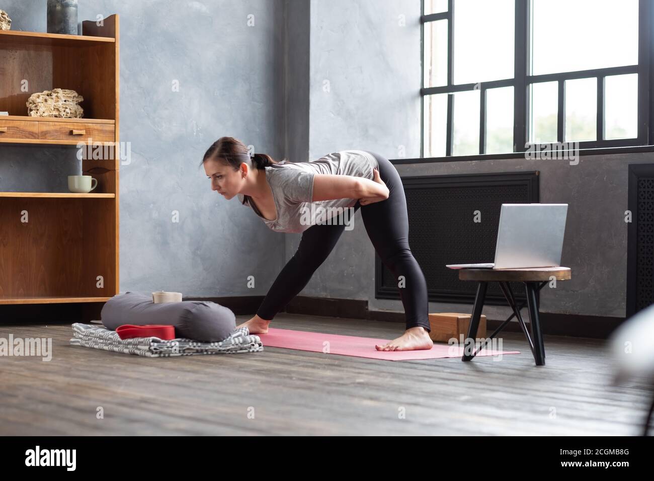 Doing prasarita padottanasana hi-res stock photography and images - Alamy