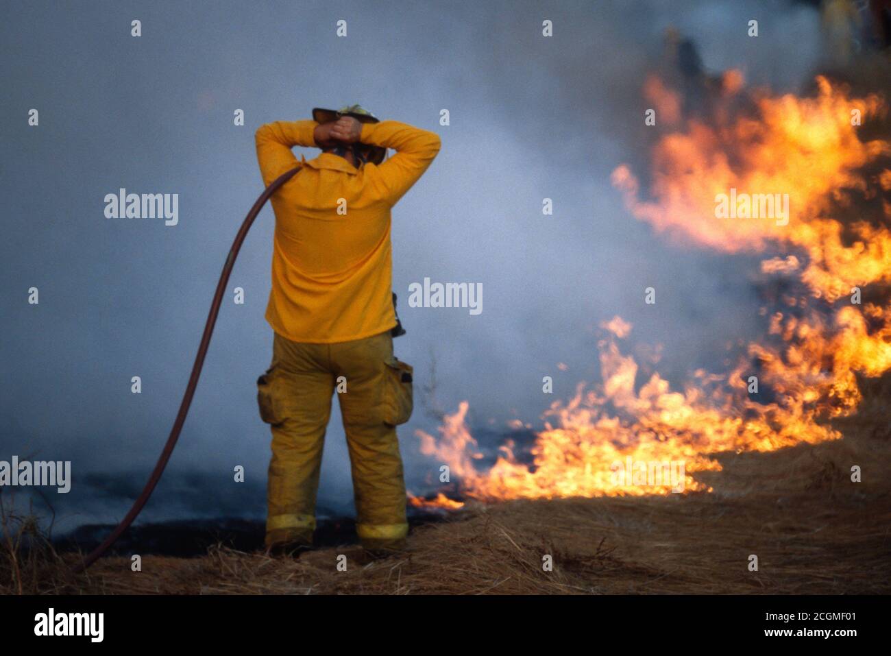 Fireman Fighting wildfire in California, USA Stock Photo - Alamy