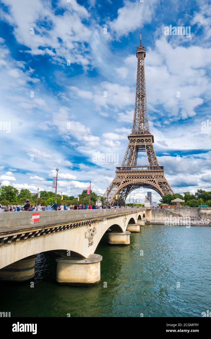 The Eiffel Tower and the bridge crossinf the river Seine in Paris on a ...