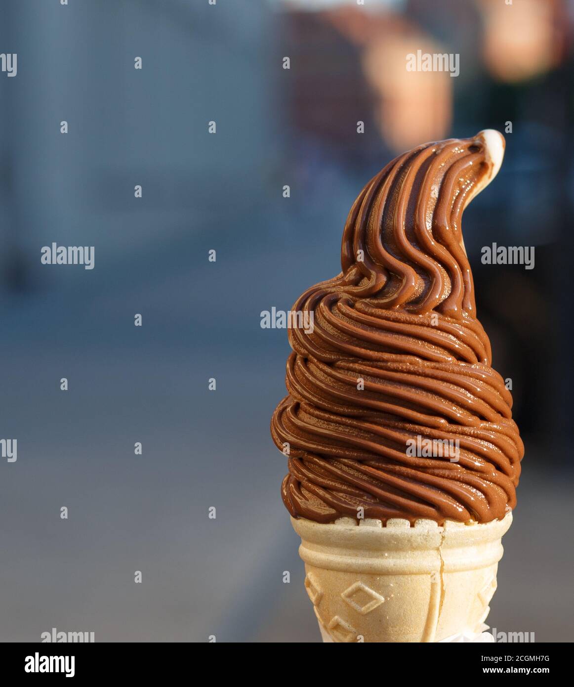 twisted chocolate ice cream in a waffle cone Stock Photo - Alamy