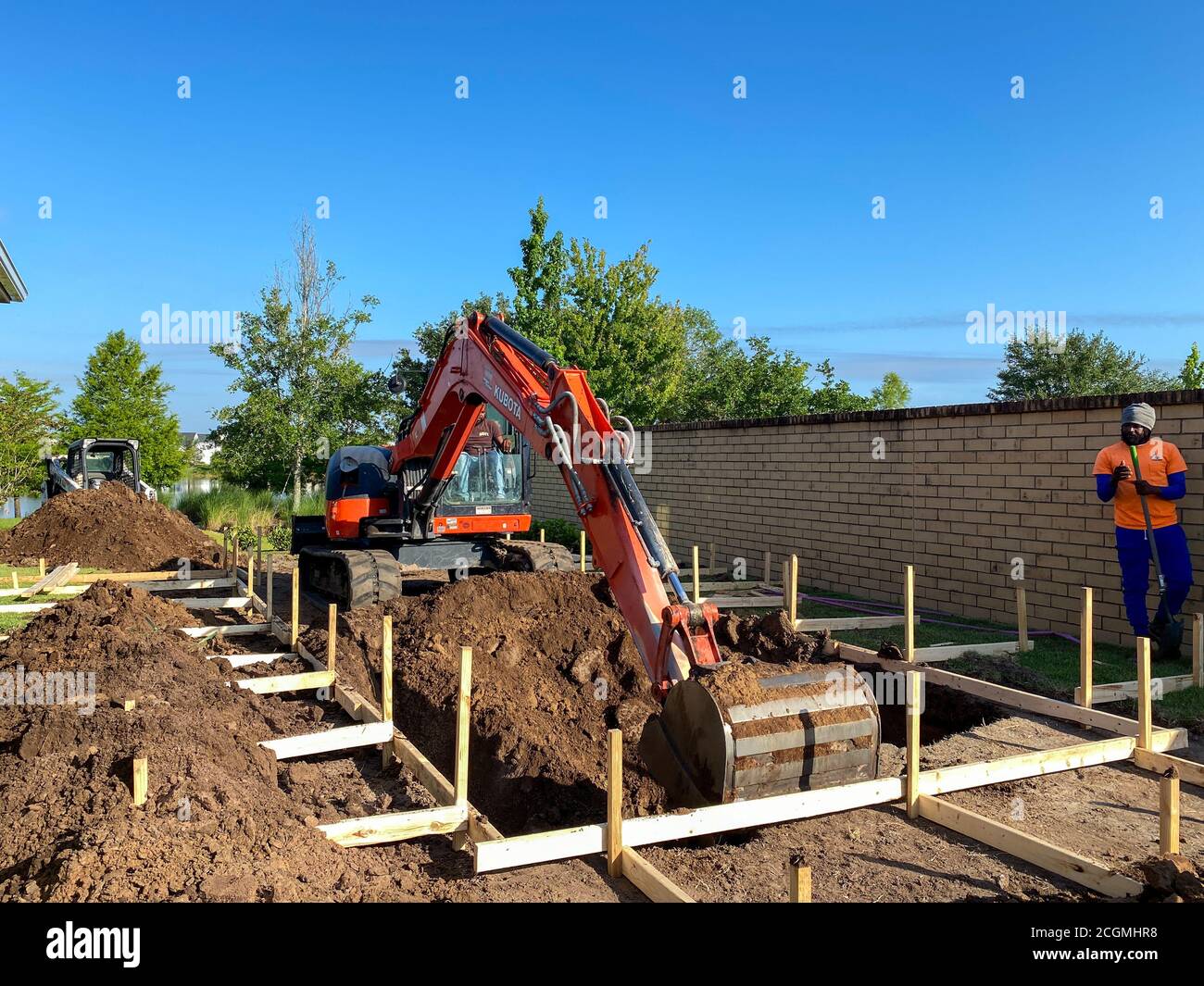 Backhoe digging hi-res stock photography and images - Alamy