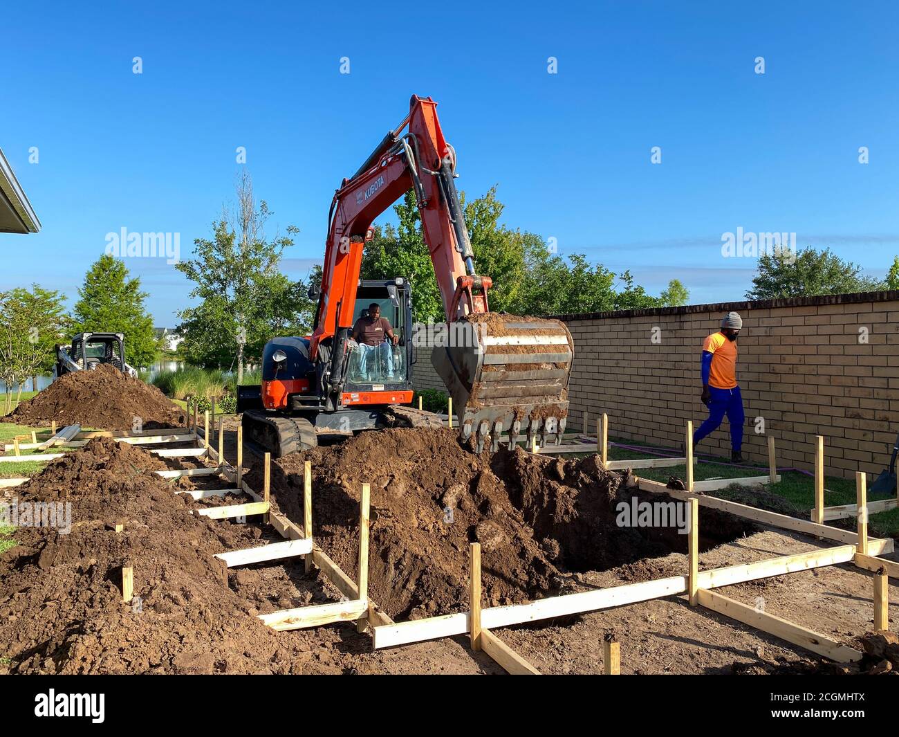 Backhoe digging hi-res stock photography and images - Alamy