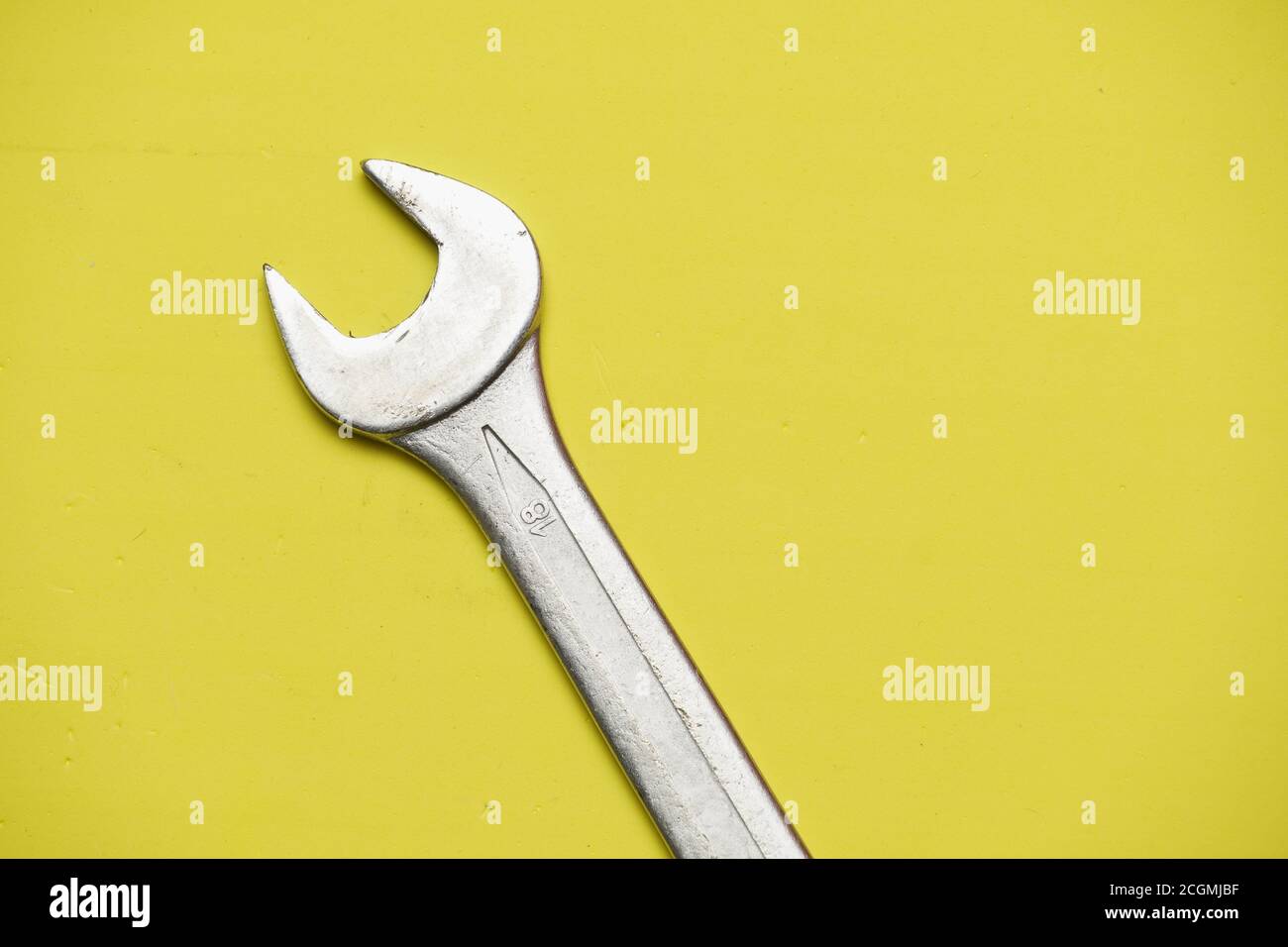 top view of tool on a yellow colorful background. flat lay flat design ...
