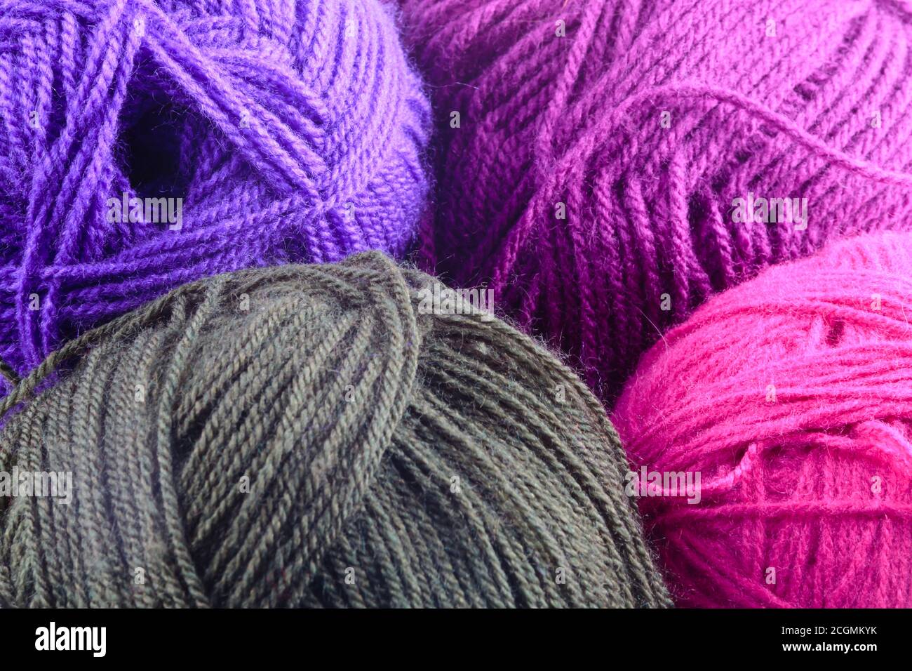Assorted Colors of Rolled Yarn Stock Photo - Alamy