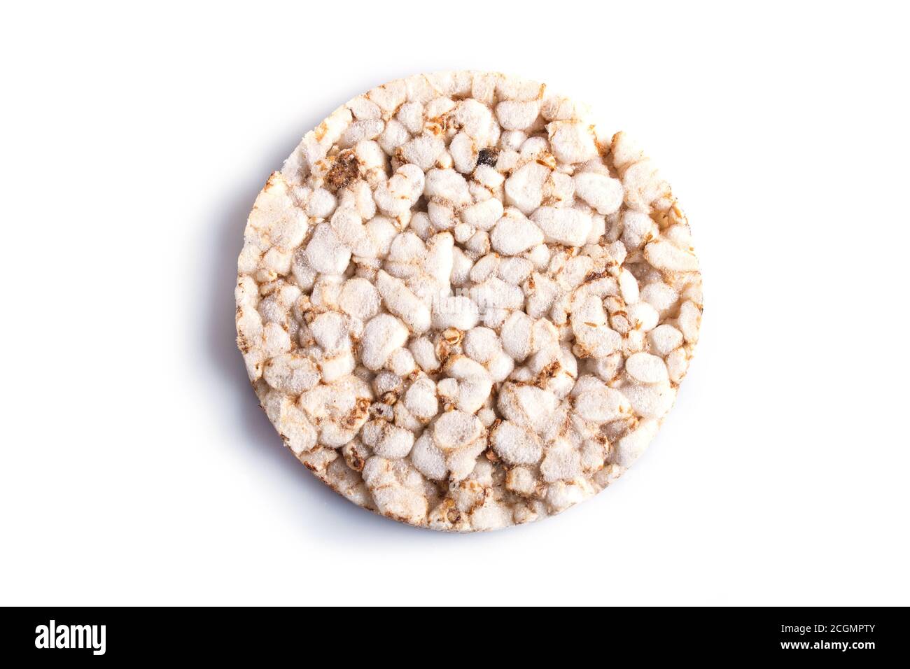 Single rice cake isolated on white background. close up Stock Photo - Alamy