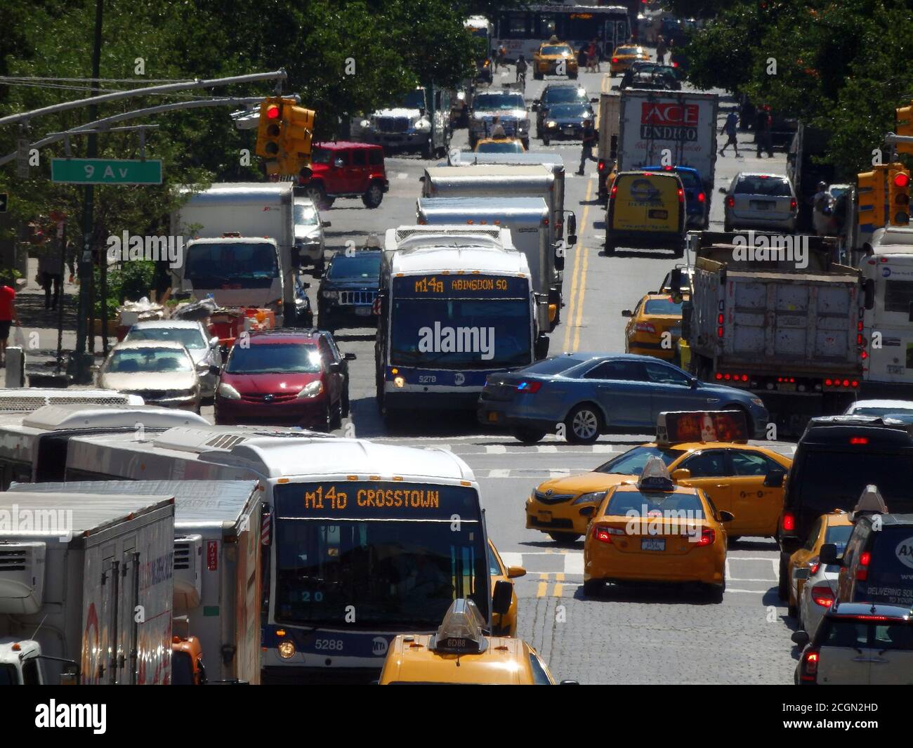 Traffic heading down a busy New York City street, United States Stock ...
