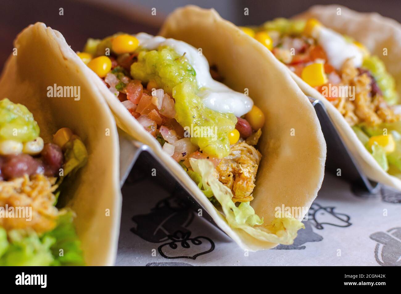Delicious Mexican Food Tacos and Guacamole Trio Stock Photo - Alamy