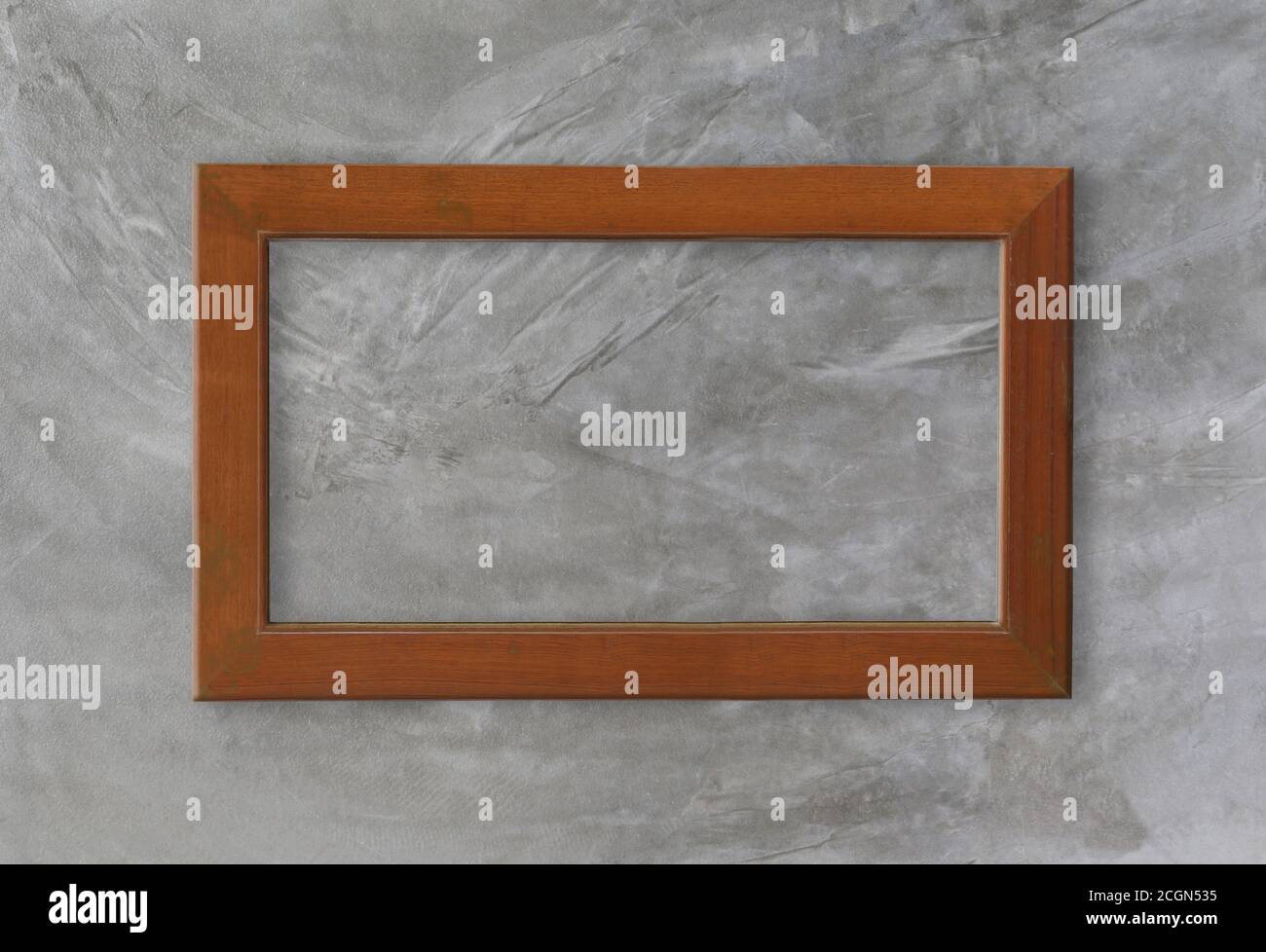 Empty wooden frame on gray cement wall background for design in your ...