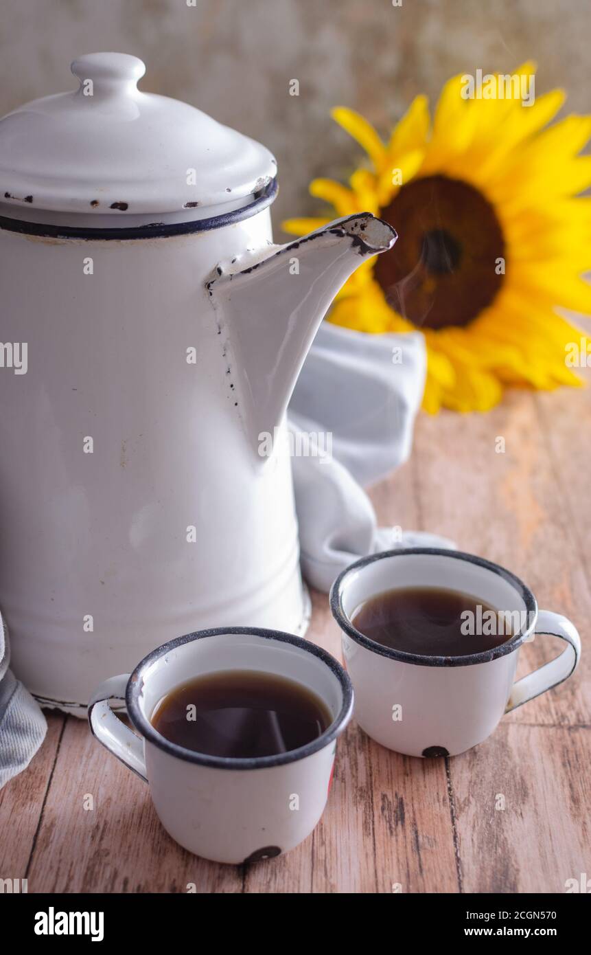 Cup of Coffee and Sunflower, rustic background Stock Photo - Alamy