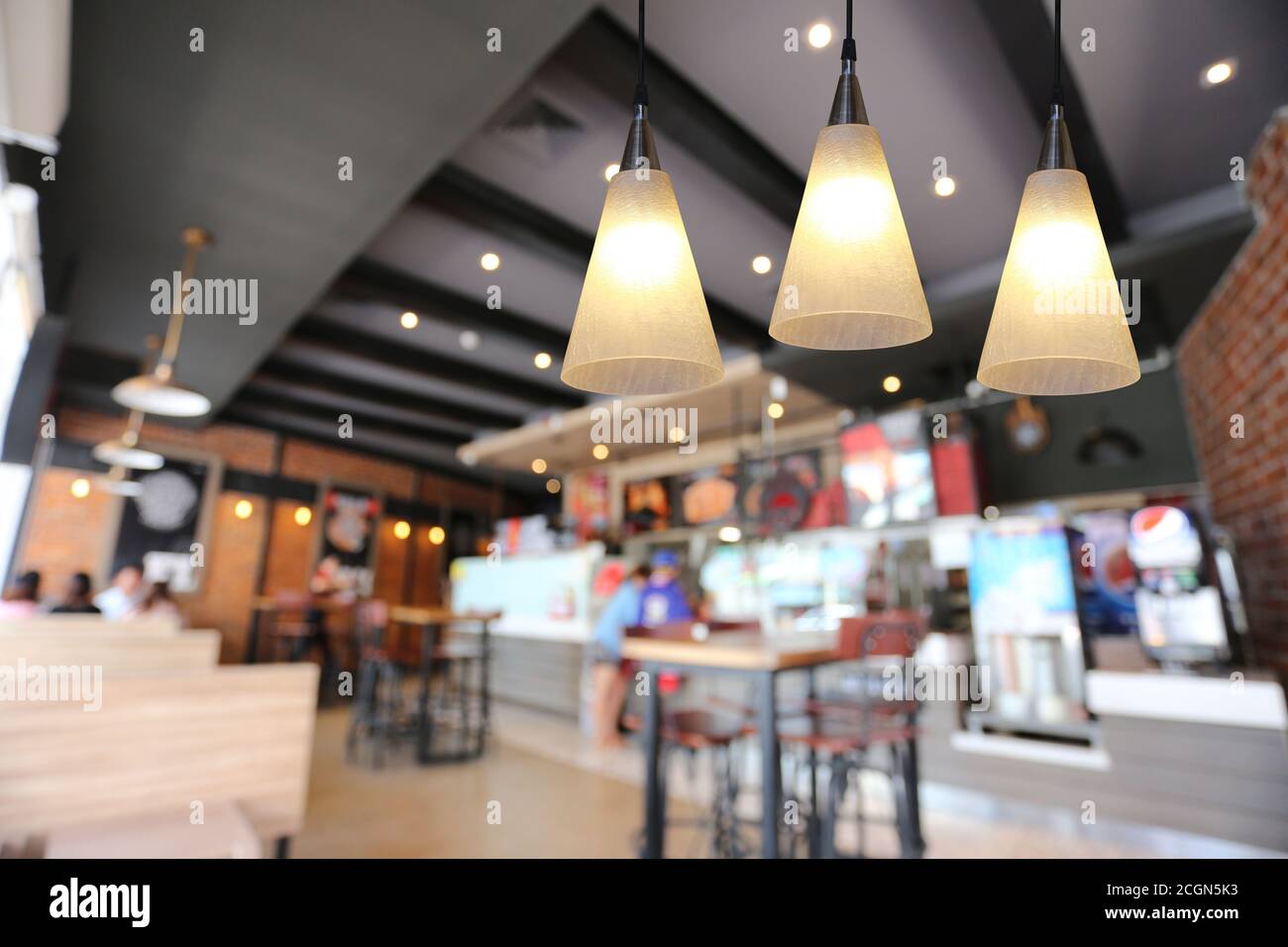 Modern lamp hanging from the ceiling of the restaurant for design in ...