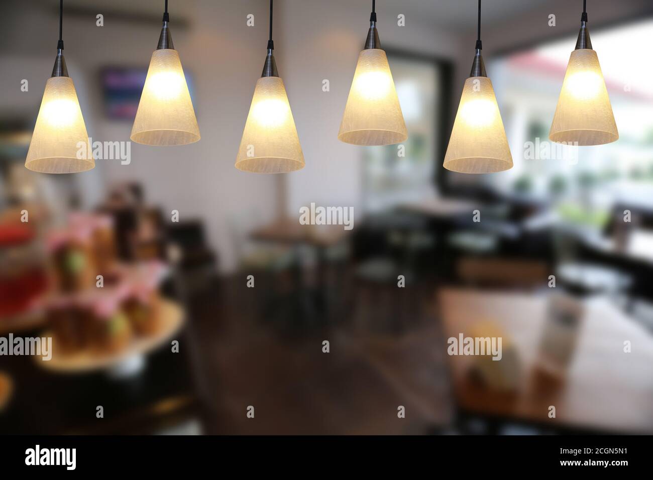 Modern lamp hanging from the ceiling of the restaurant for design in ...