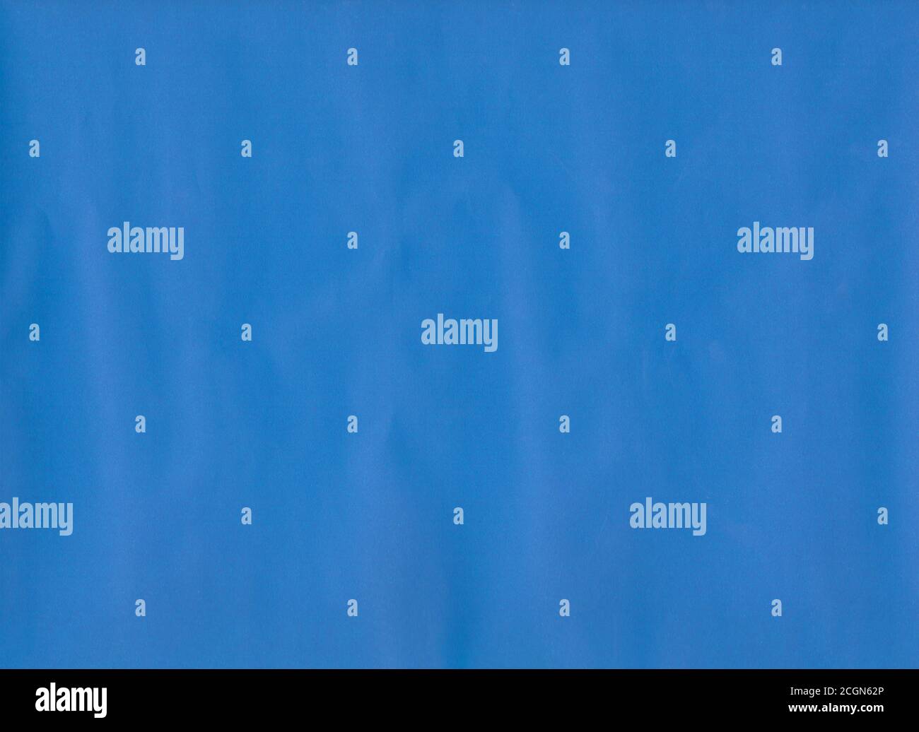 Uneven or creased blue art paper for background design Stock Photo - Alamy