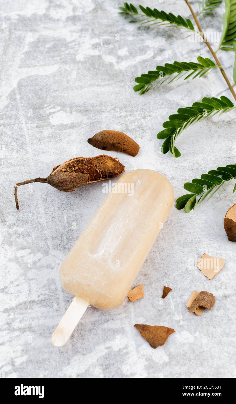 Tamarind Popsicle with Tamarind Fruit in Gray Background Rustic Stock ...
