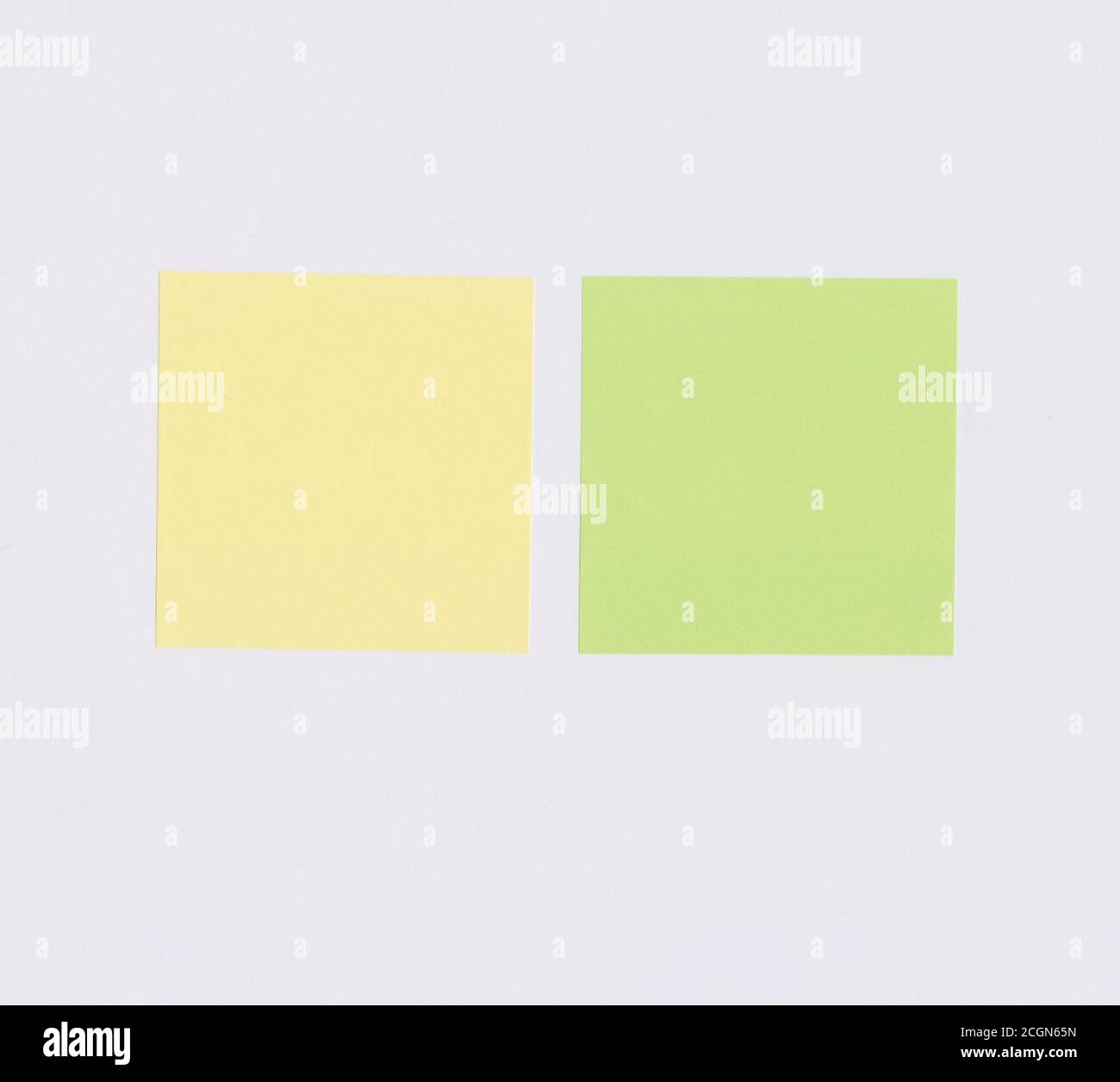 Colorful square note paper on white paper background and have copy ...