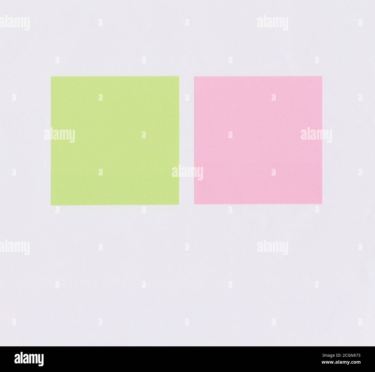 Colorful square note paper on white paper background and have copy ...