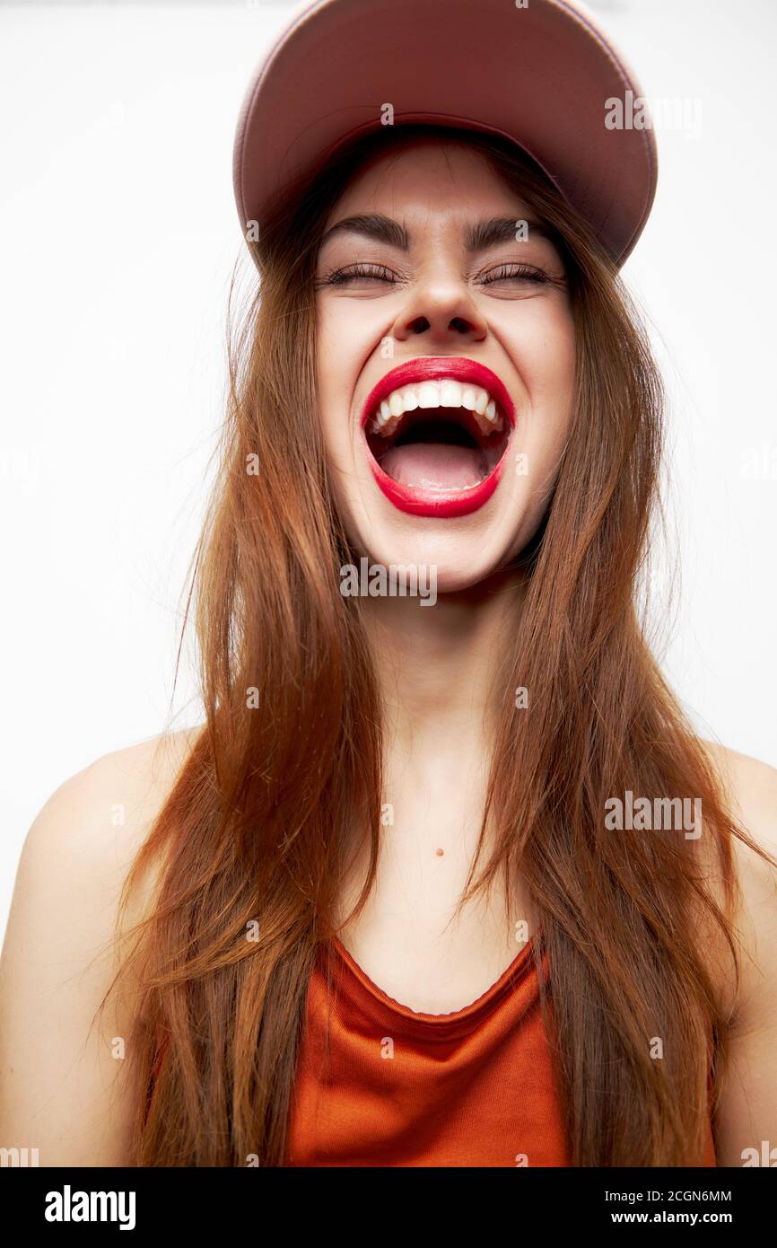 Beautiful woman in a cap Fun closed eyes smile model fashionable ...
