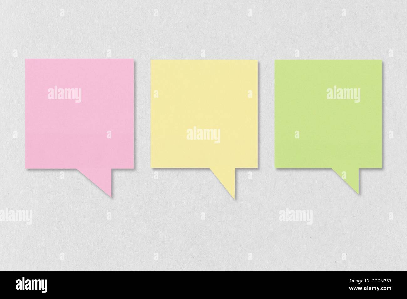 Colorful square note paper on white paper background and have copy ...