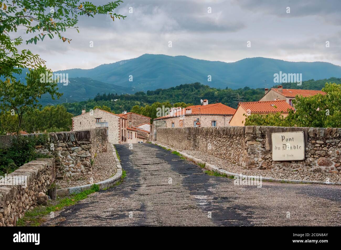The ancient Pont du Diable bridge, built in the 14th century, located ...