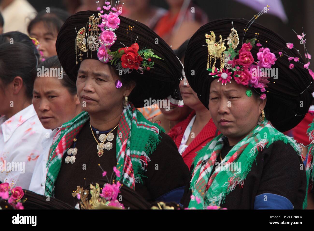Achang women in traditional costume, at a village dance competition ...