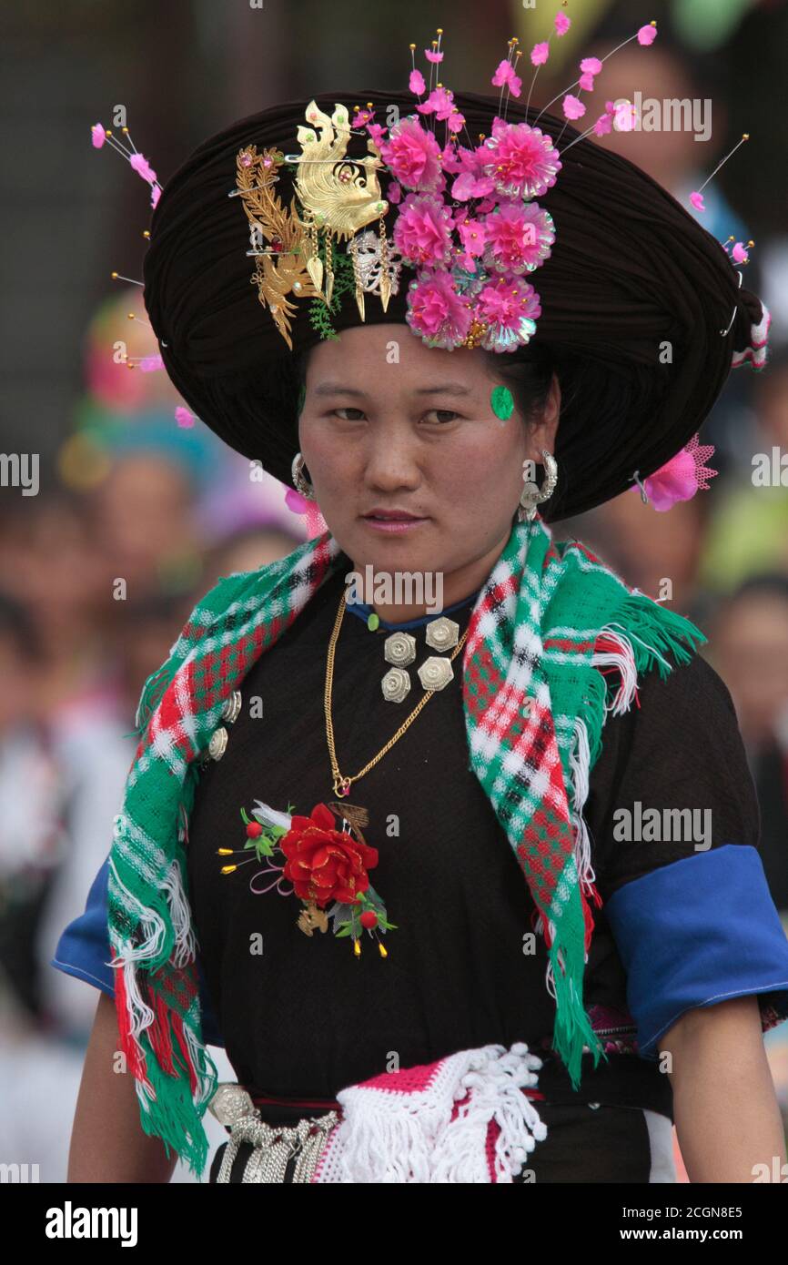 Achang women in traditional costume, at a village dance competition ...