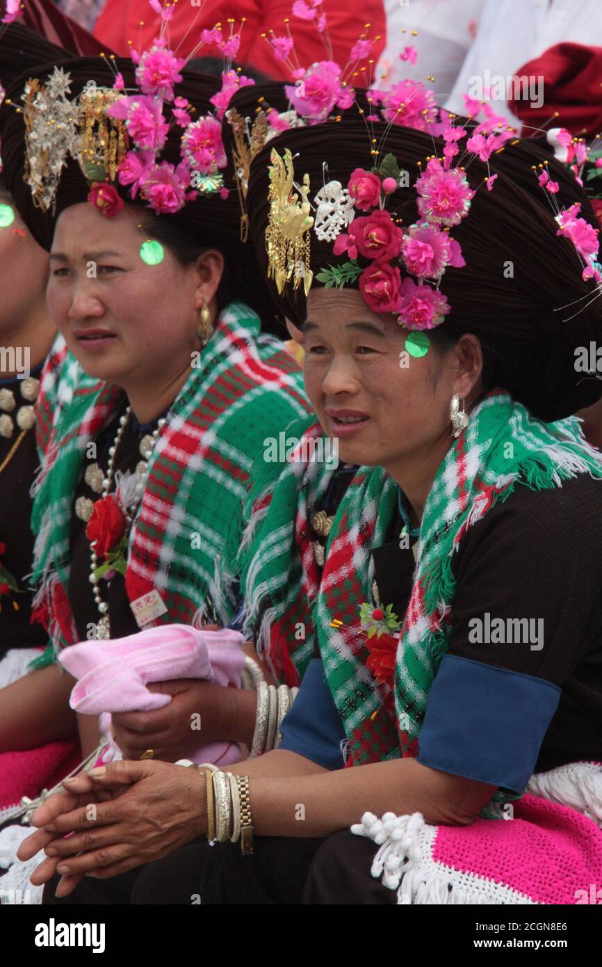 Achang women in traditional costume, at a village dance competition ...