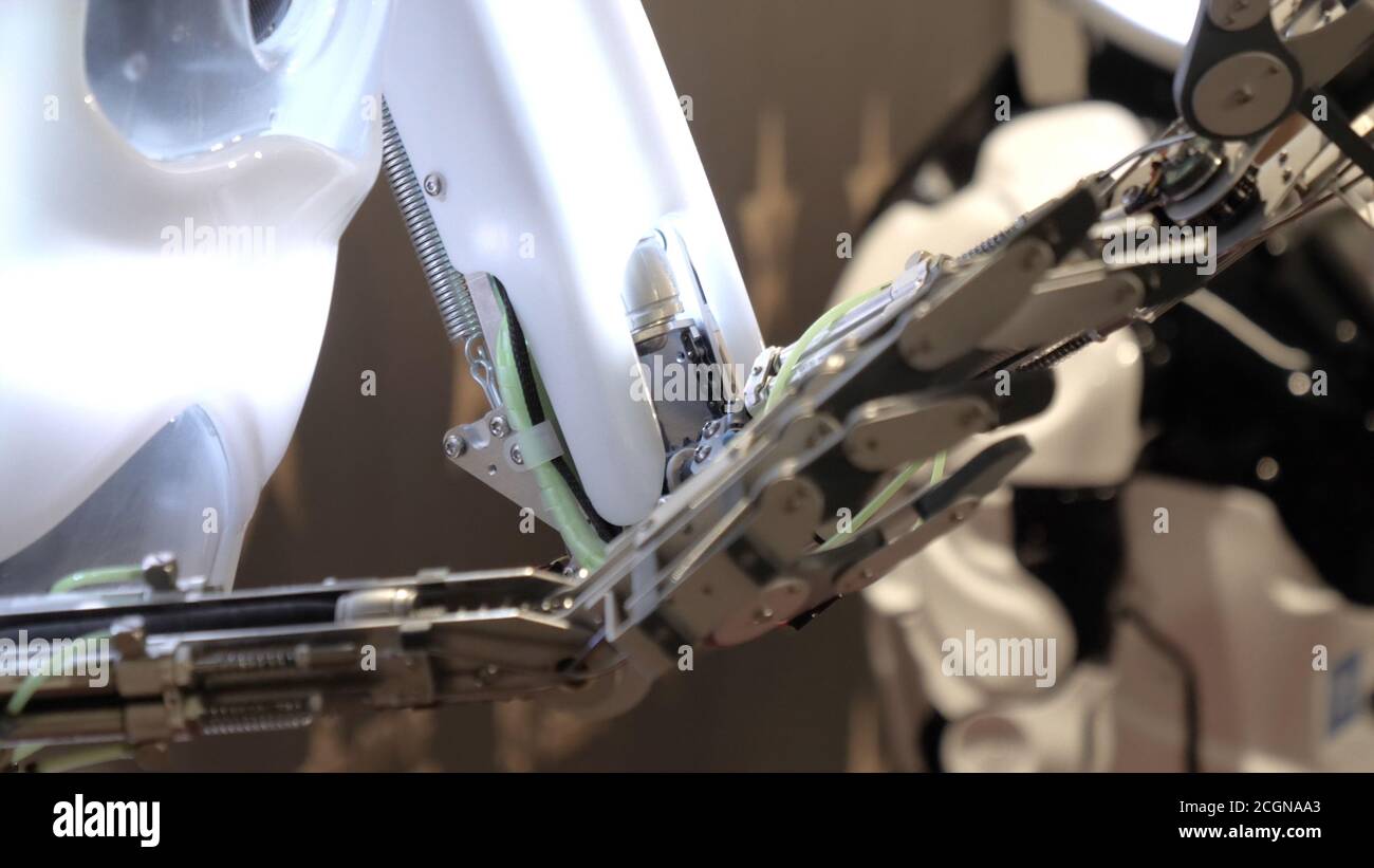 Futuristic robotic cyborg arms in action Stock Photo - Alamy