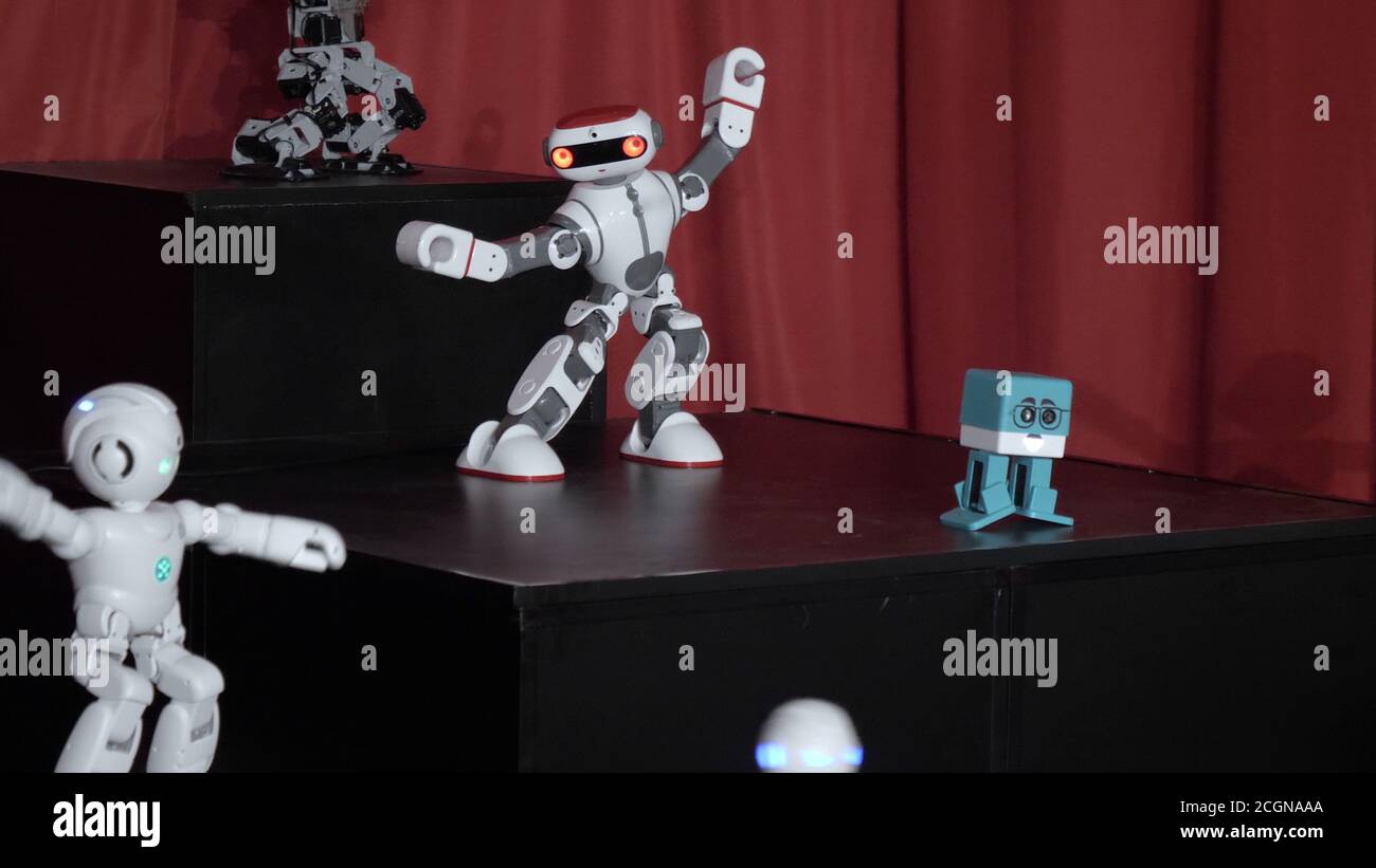Toy robot dancing show. Modern technologies Stock Photo - Alamy