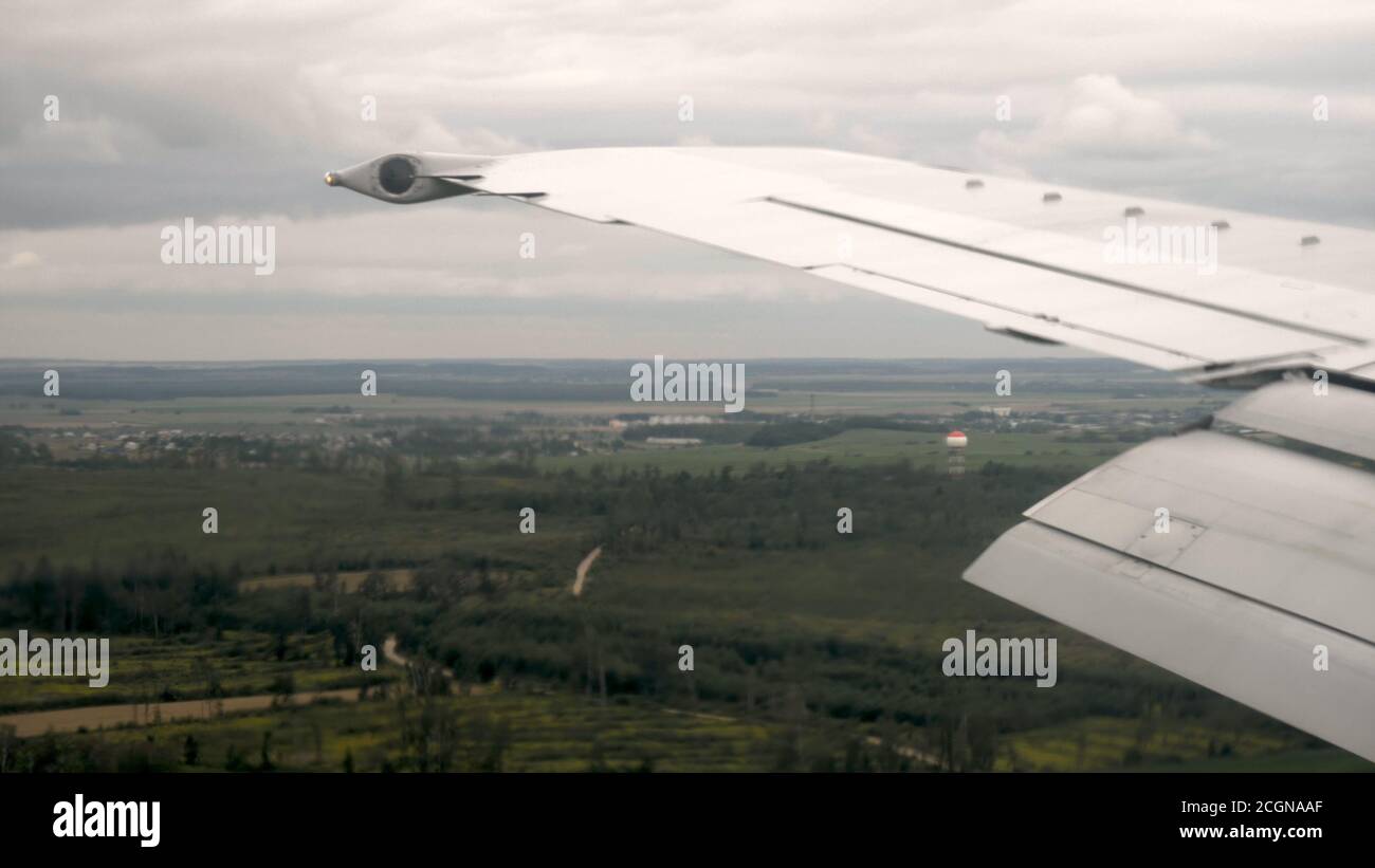 Airplane landing. Look through aircraft window during flight Stock ...