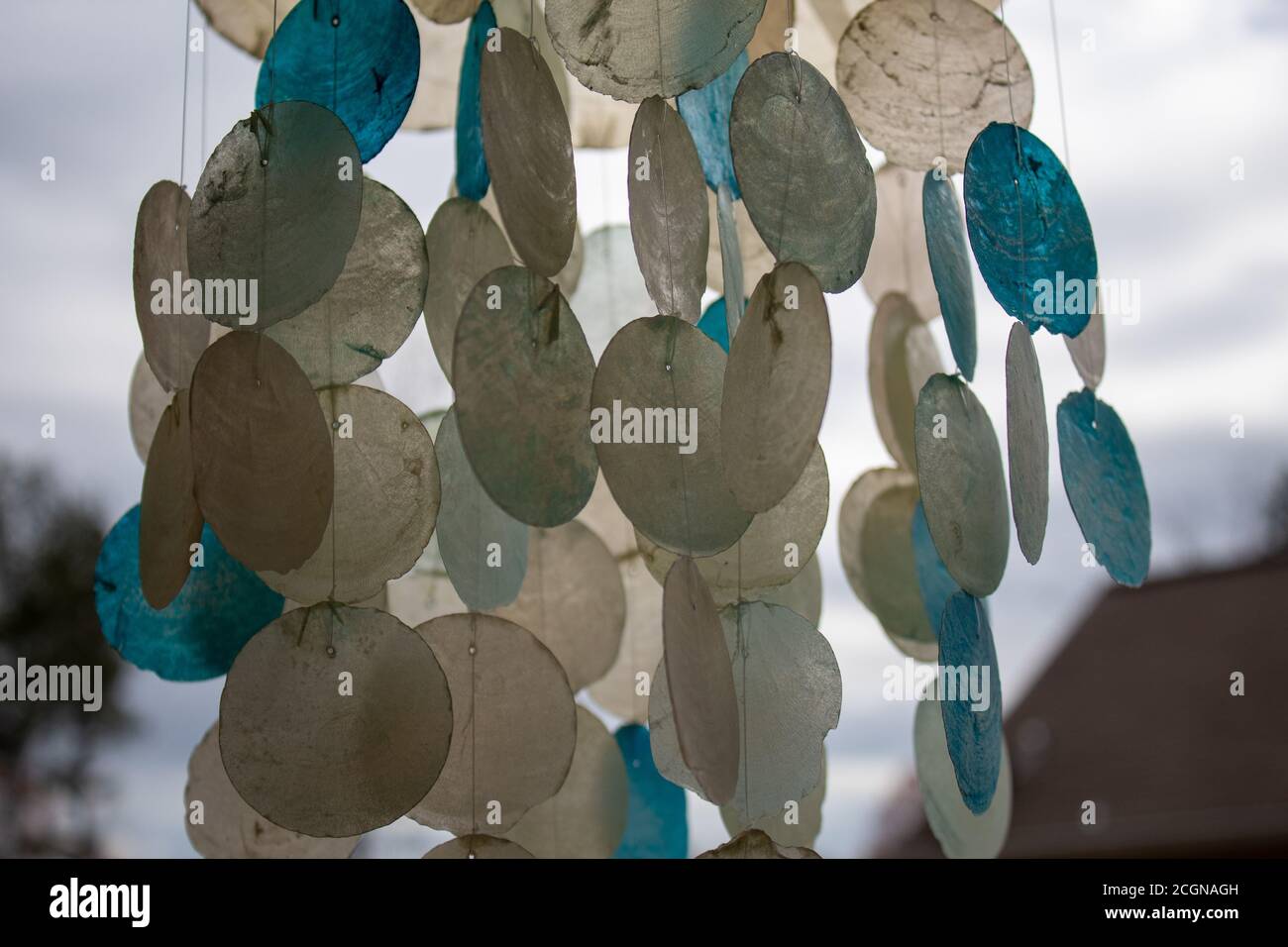 Wind Chimes made of fishing line and seashells Stock Photo - Alamy