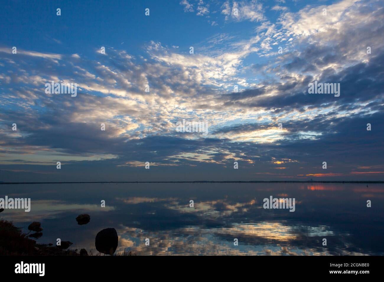 Sunset reflection over water hi-res stock photography and images - Alamy