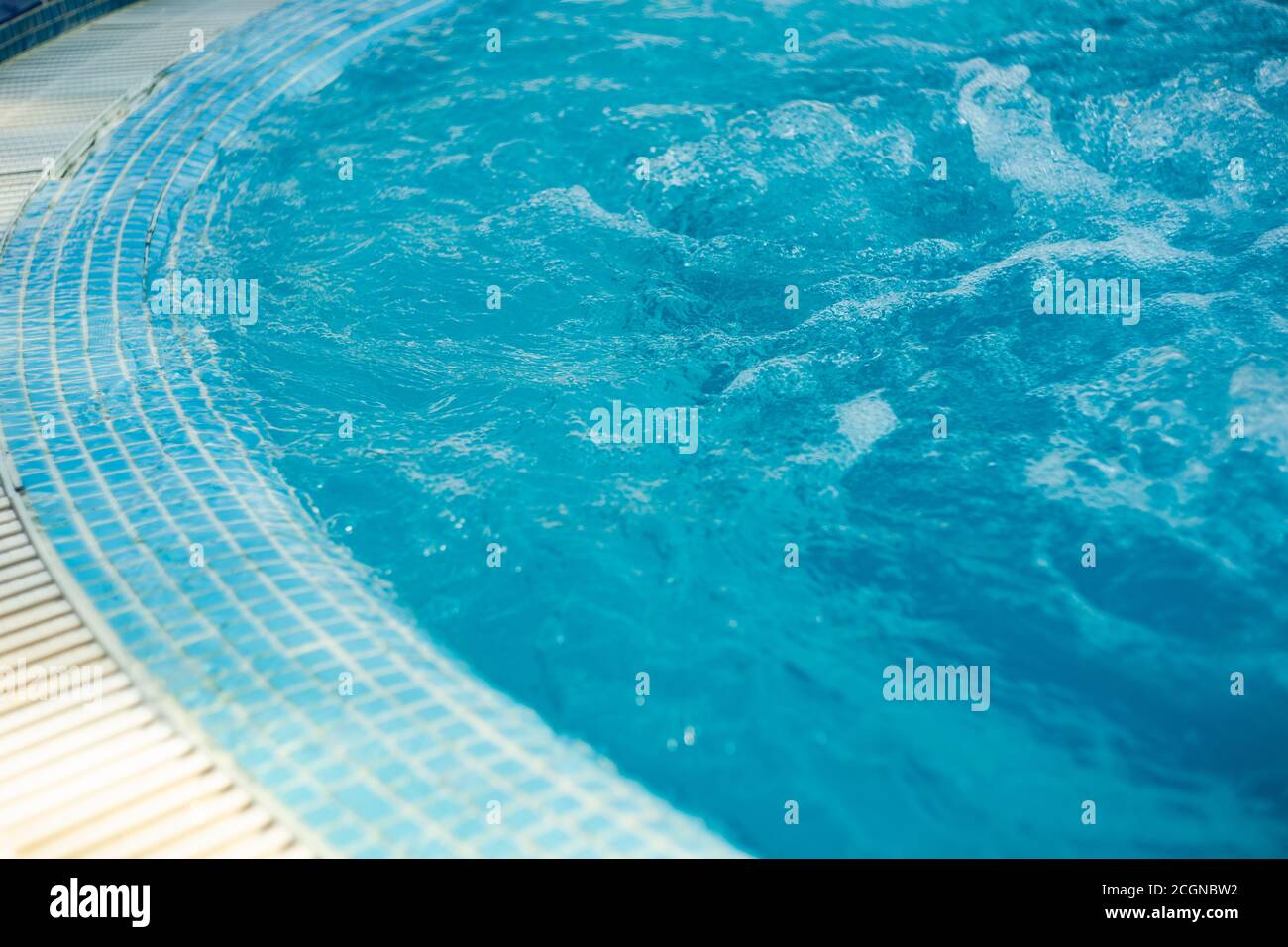 Outdoor pool with blue water as a summer travel concept Stock Photo - Alamy